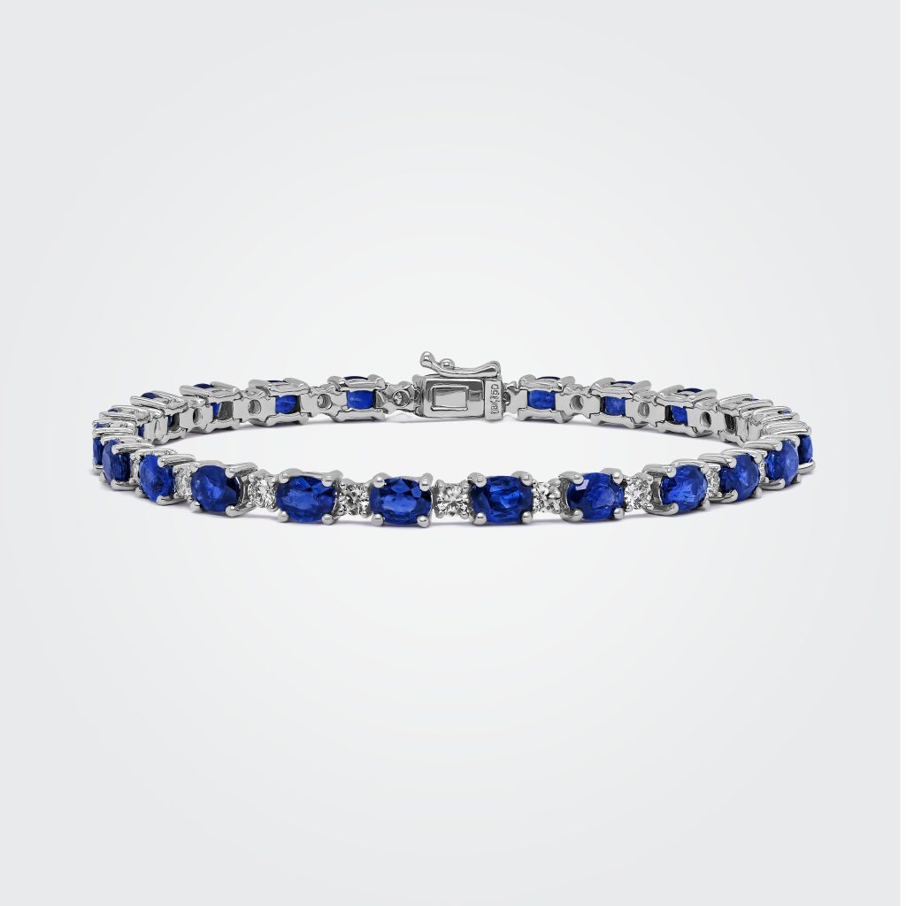 Dahlia Oval Blue Sapphires Round Diamonds Claw Set 18ct White Gold Tennis Bracelet - Alan Bick
